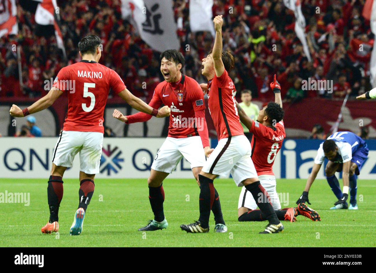Japan's Urawa Red Diamonds players celebrates after winning the second ...