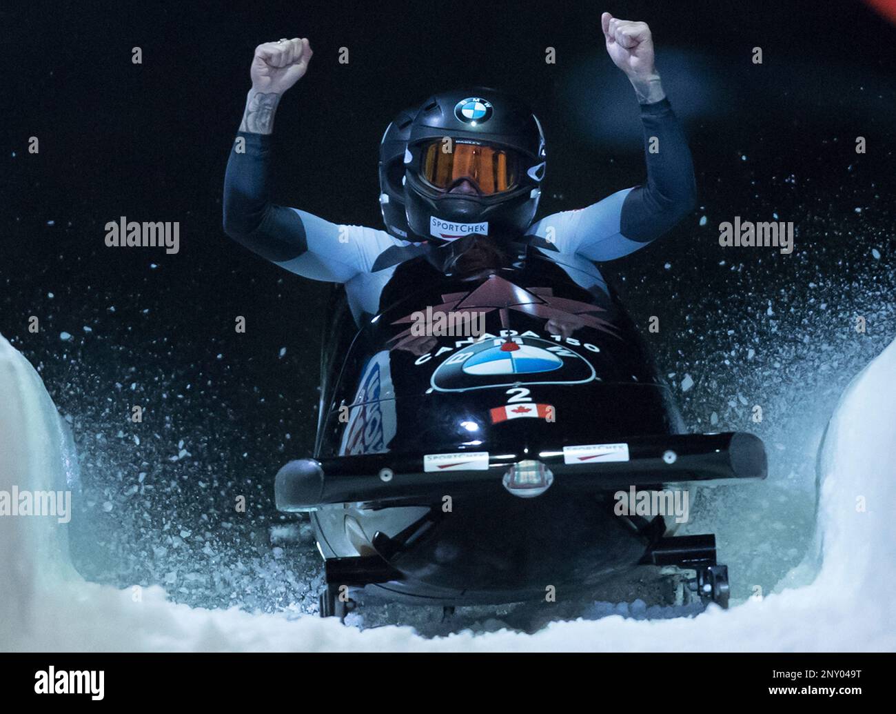 Canada's Kaillie Humphries, front, and Melissa Lotholz celebrate after ...