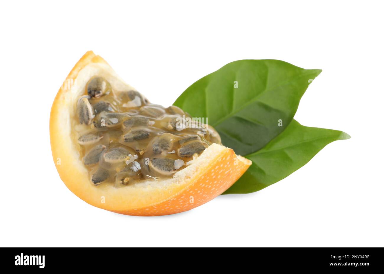 Piece of delicious ripe granadilla with green leaves on white ...