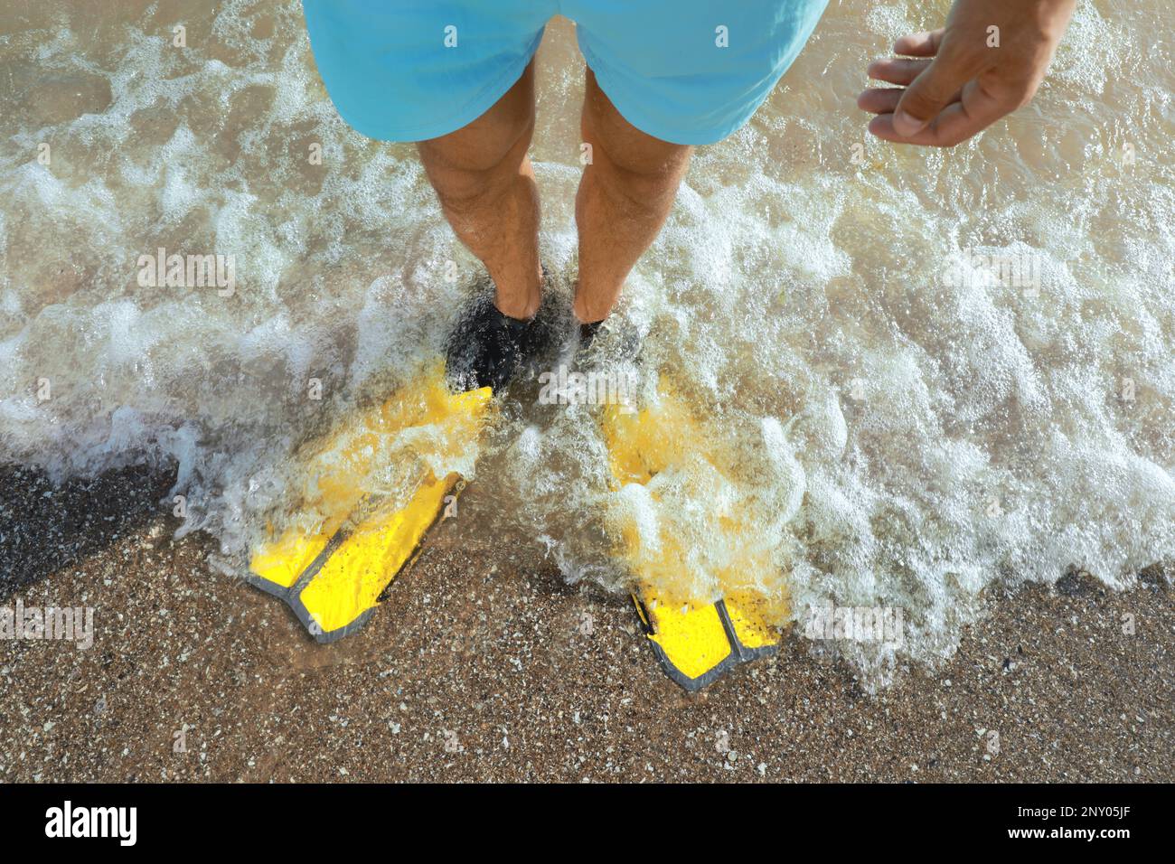 Top view of man in flippers on beach Stock Photo - Alamy