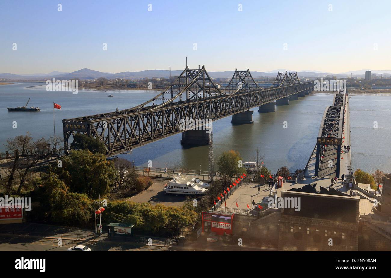 A picture shows the Sino-Korean Friendship Bridge(L) in Dandong, China ...