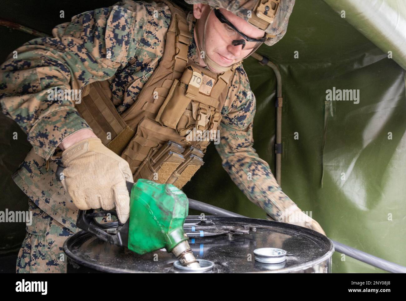 1051- U.S. Marine Corps Cpl. Austin Fesler, a Bulk Fuel Specialist with ...