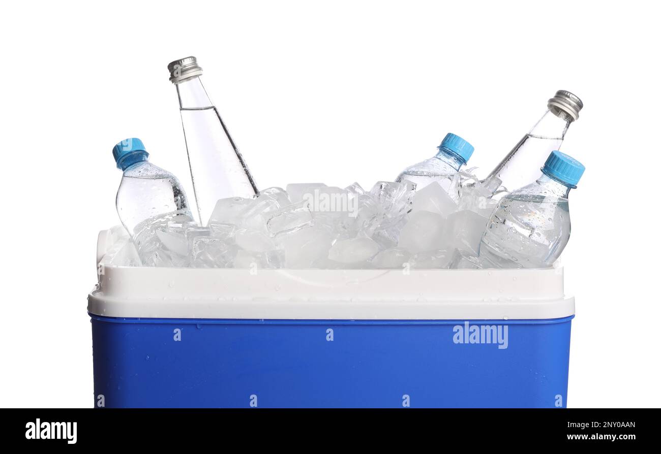 Blue plastic cool box with ice cubes and bottles of water on white ...