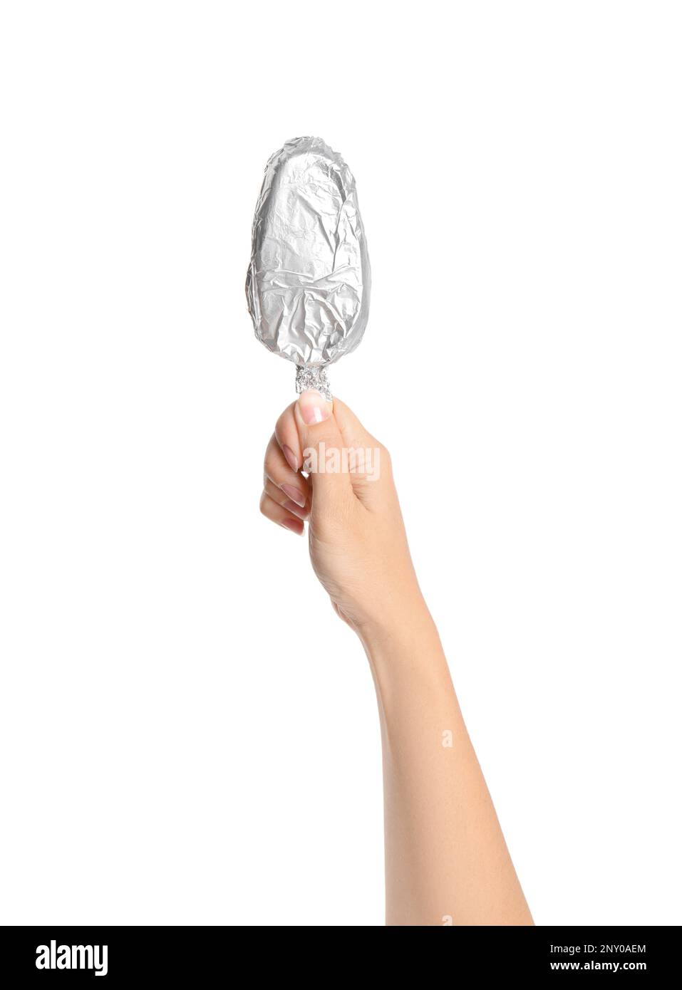 Woman holding ice cream wrapped in foil on white background, closeup ...