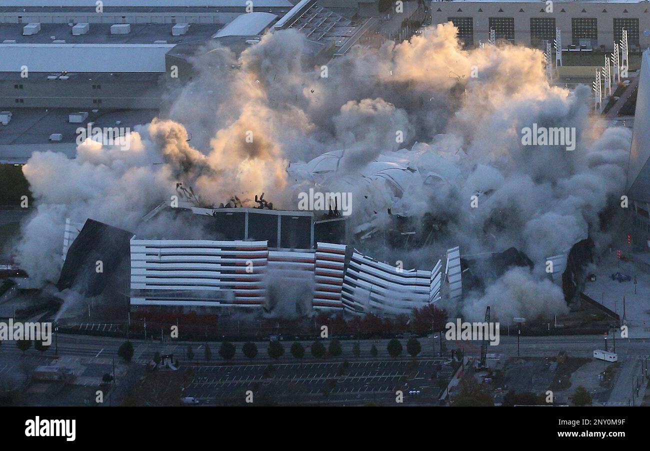 The Georgia Dome comes crumbling down in a ball of dust on Monday ...
