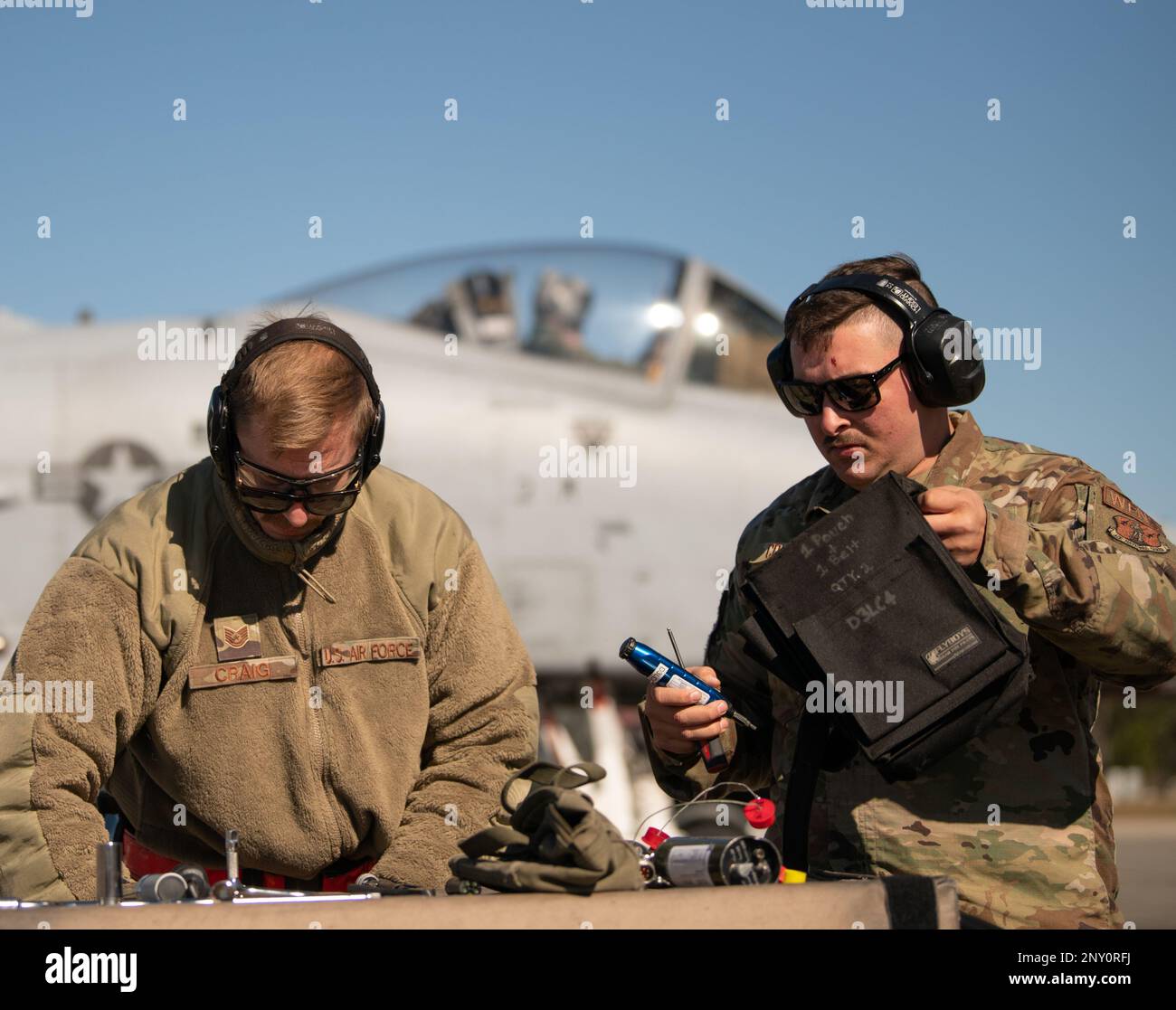 U.S. Air Force Tech. Sgt. Kiley Craig, left, and Sr. Airman Vincent ...