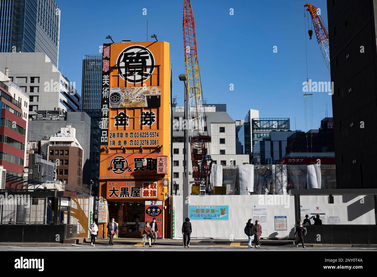 Tokyo, Japan. 28th Feb, 2023. A surviving hold-out old construction ...