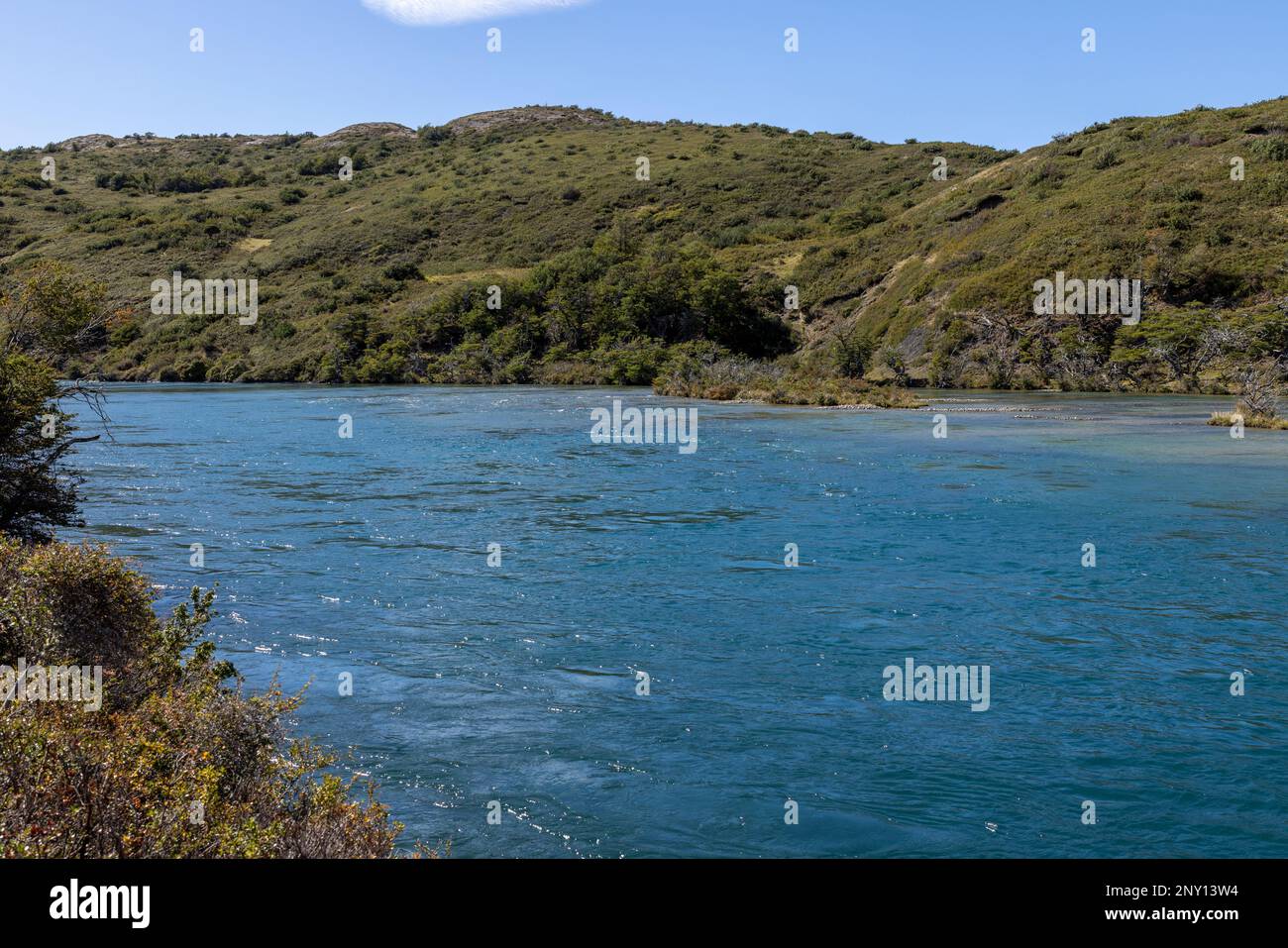 Serrano River with crystal clear blue water at Torres del Paine ...