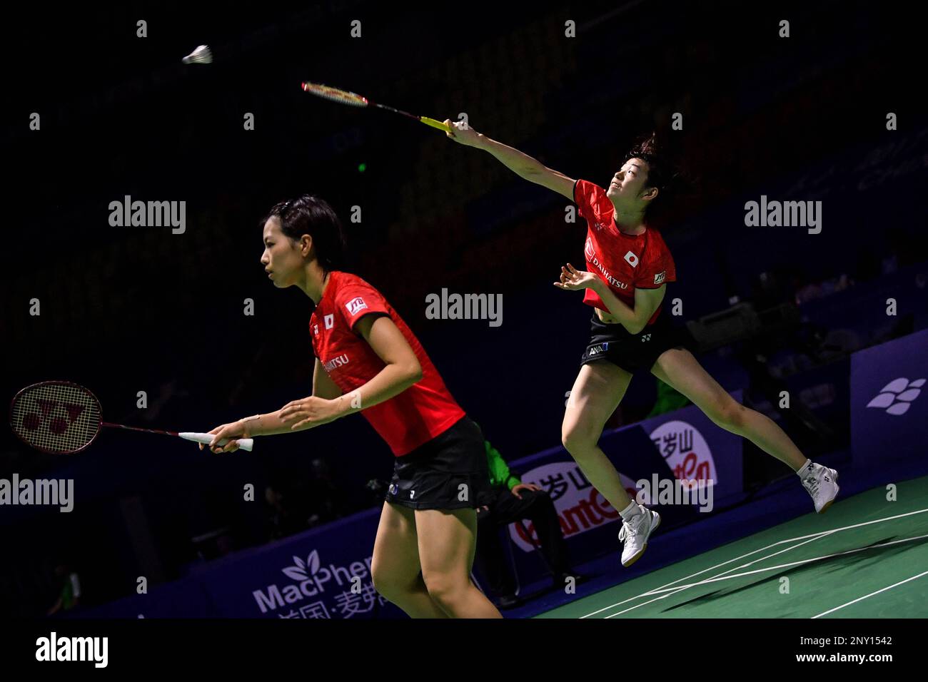 Fukushima Yuki and Sayaka Hirota of Japan compete against Chang Ching Hui and Yang Ching Tun of ...