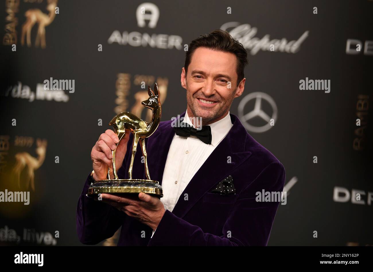 Actor Hugh Jackman poses with his 'Entertainment Bambi' during the 69th ...