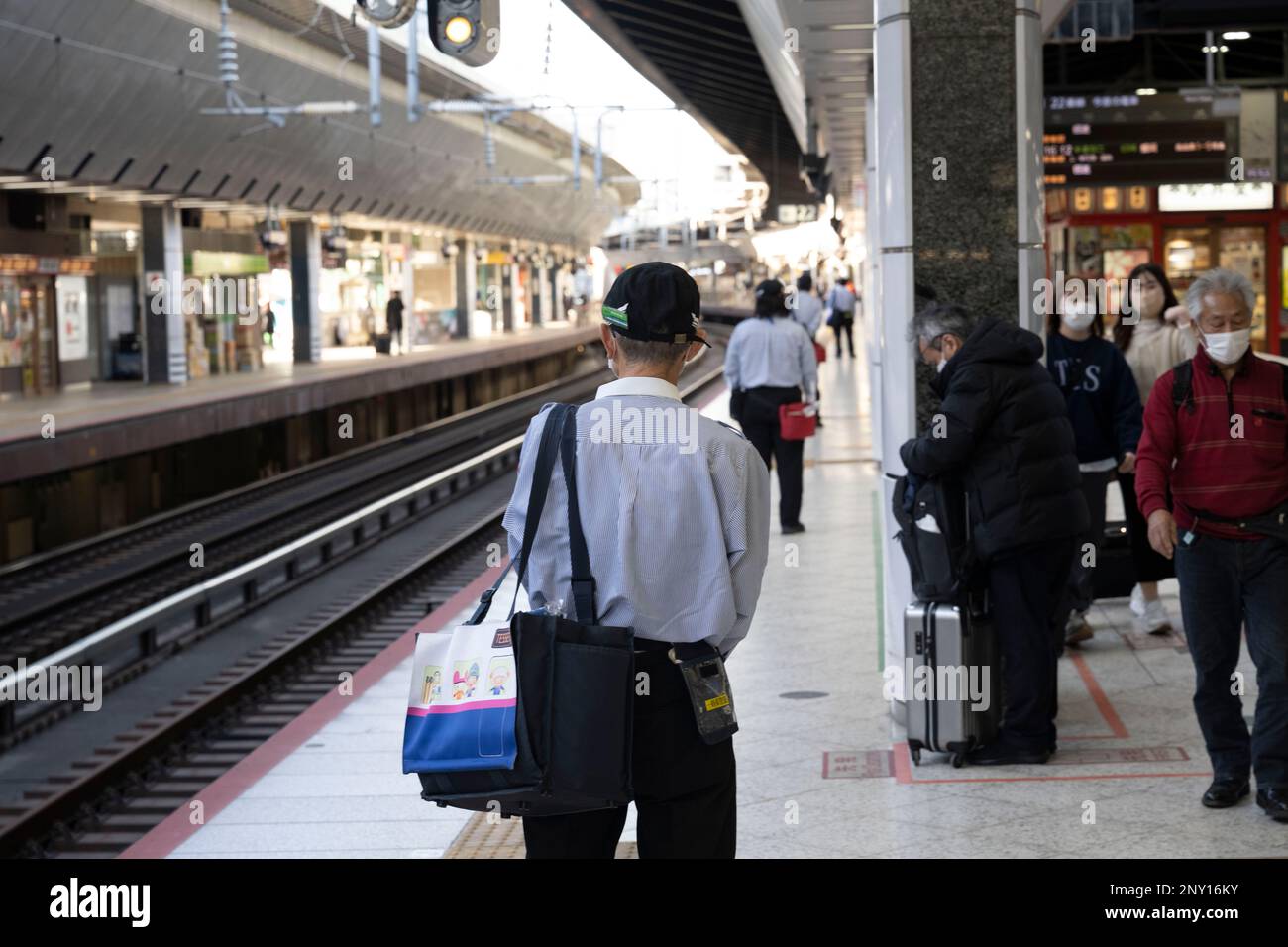Tokyo, Japan. 28th Feb, 2023. JR East cleaning crews wait for their ...