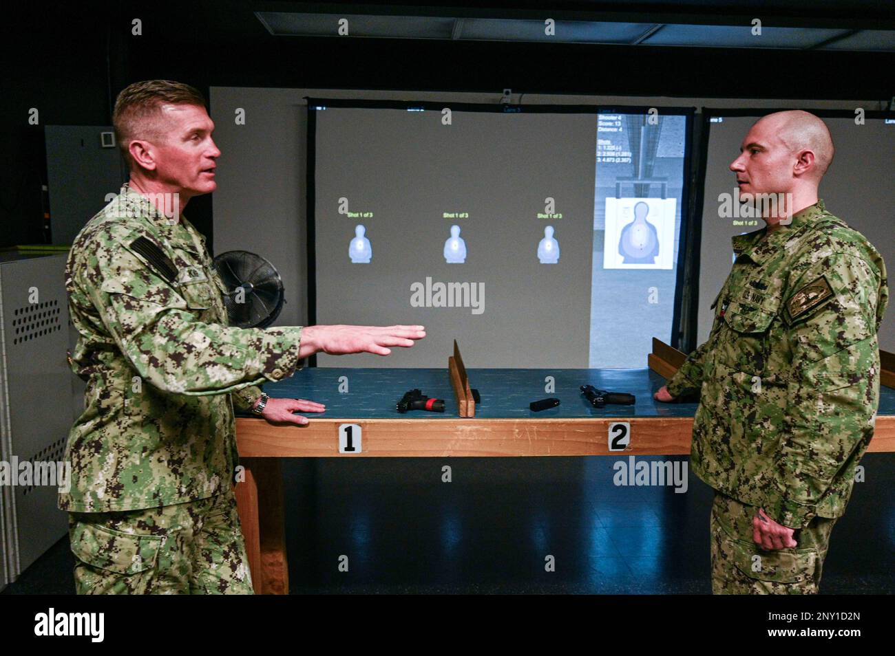 GREAT LAKES, Ill. (Feb. 23, 2023) Force Master Chief Jason Knupp, left ...