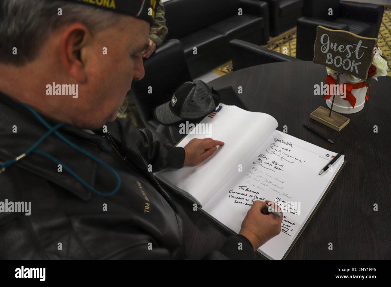 Veterans of Foreign Wars (VFW) National Commander, Tim Borland, signs V ...