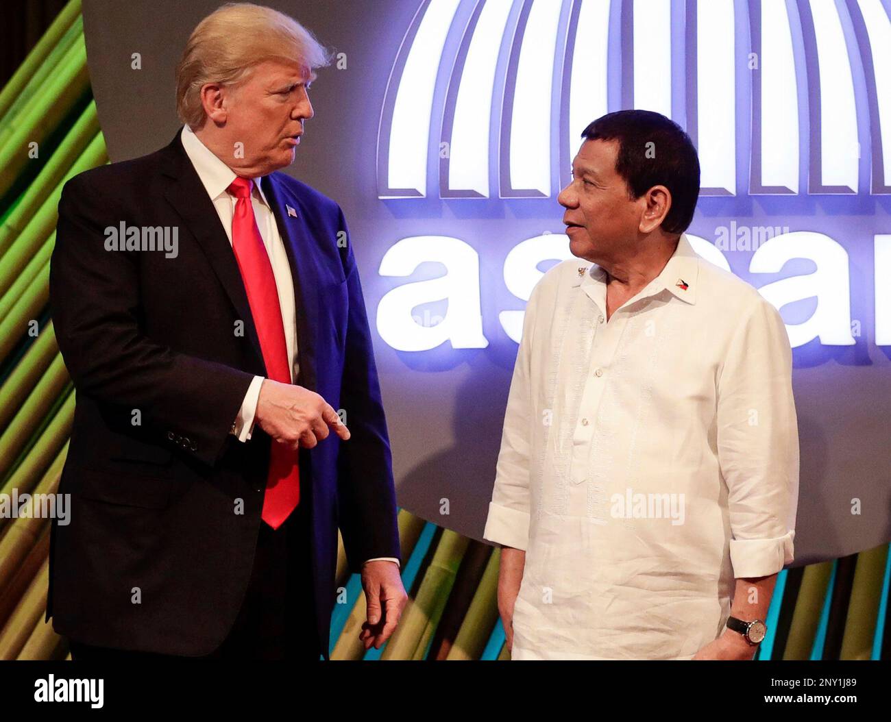 U.S. President Donald Trump, left, speaks with Philippine President ...