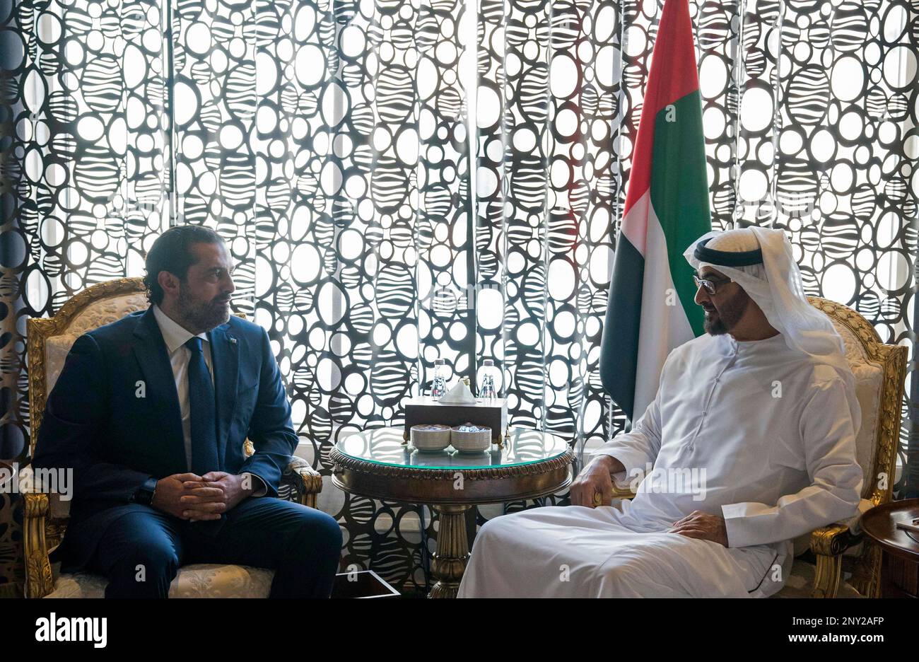 In this photo released by the Emirates News Agency, WAM, outgoing Prime ...