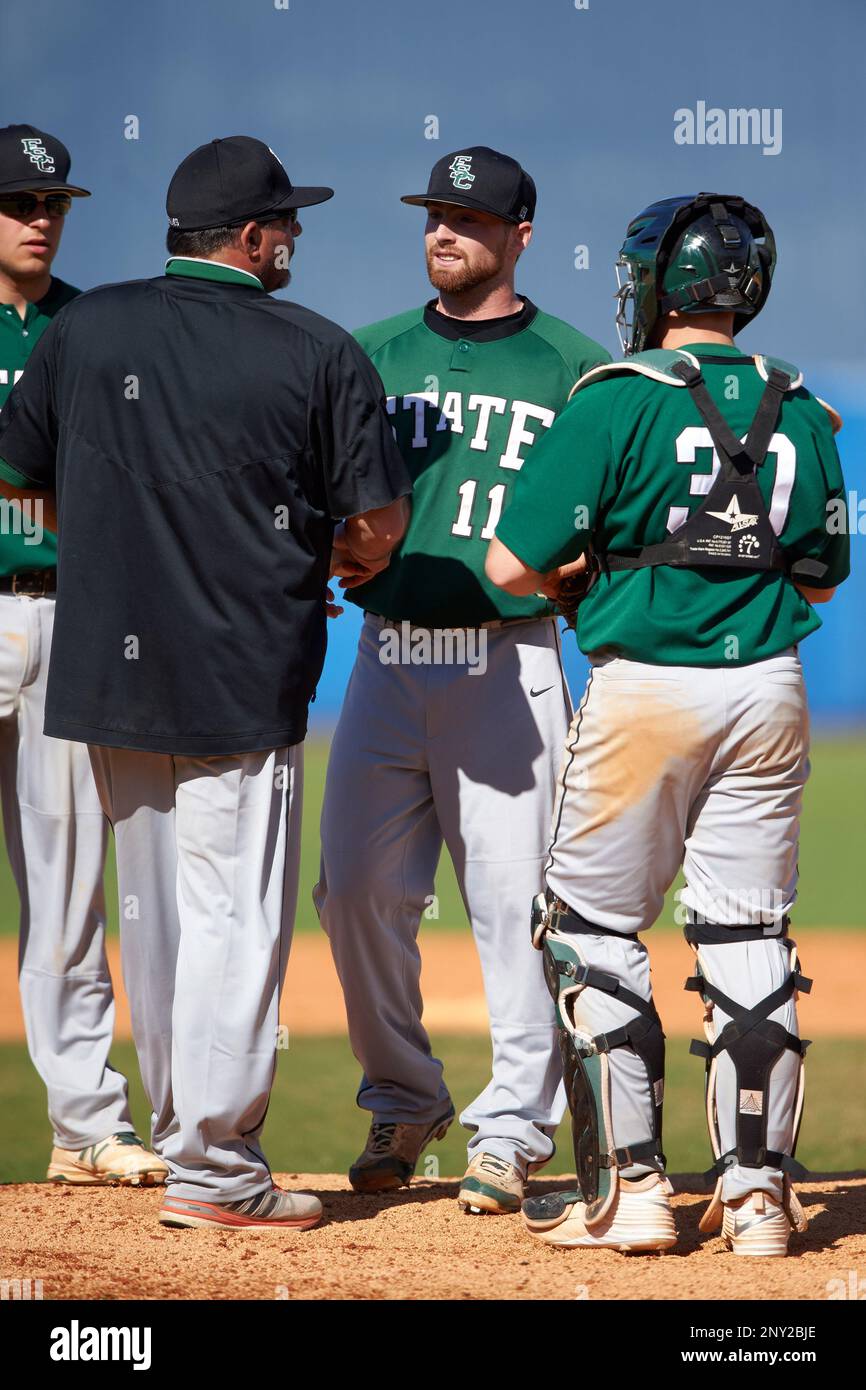 Farmingdale Rams head coach Keith Osik (jacket) talks with starting ...