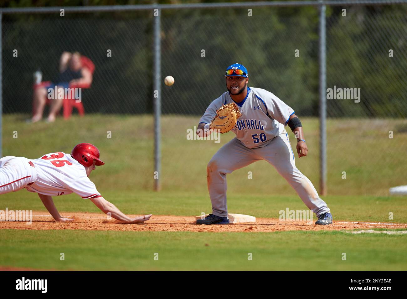 Seton Hall Pirates first baseman Mikael-Ali Mogues (50) waits for a ...