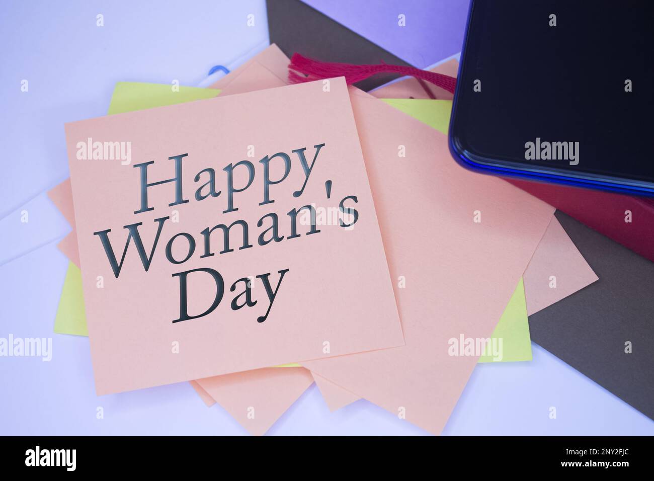 Happy Woman's Day. Text on adhesive note paper. Event, celebration ...