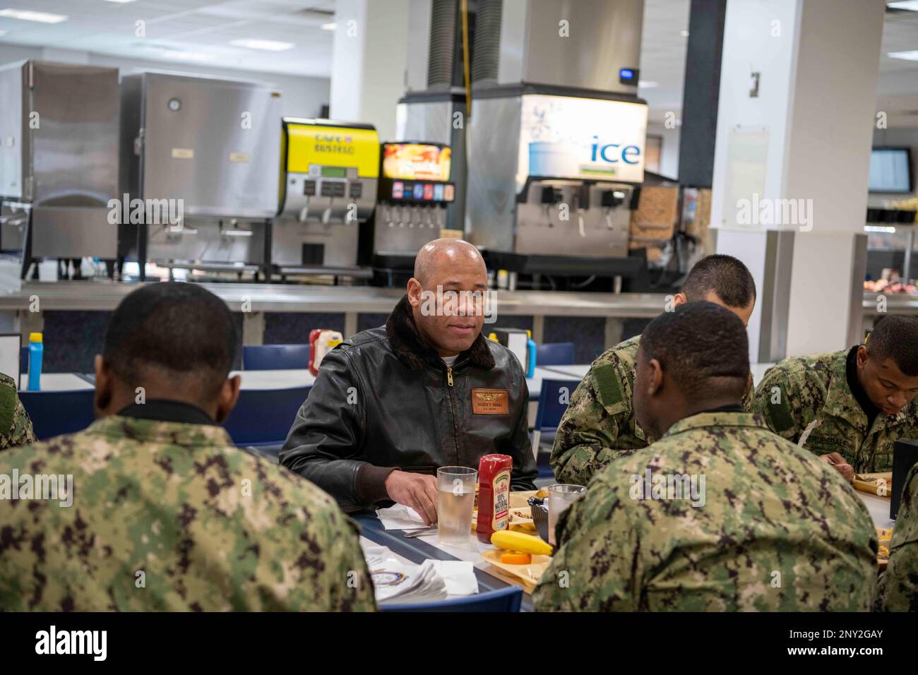 Capt. Kertreck Brooks, commanding officer, eats lunch with recruits at ...