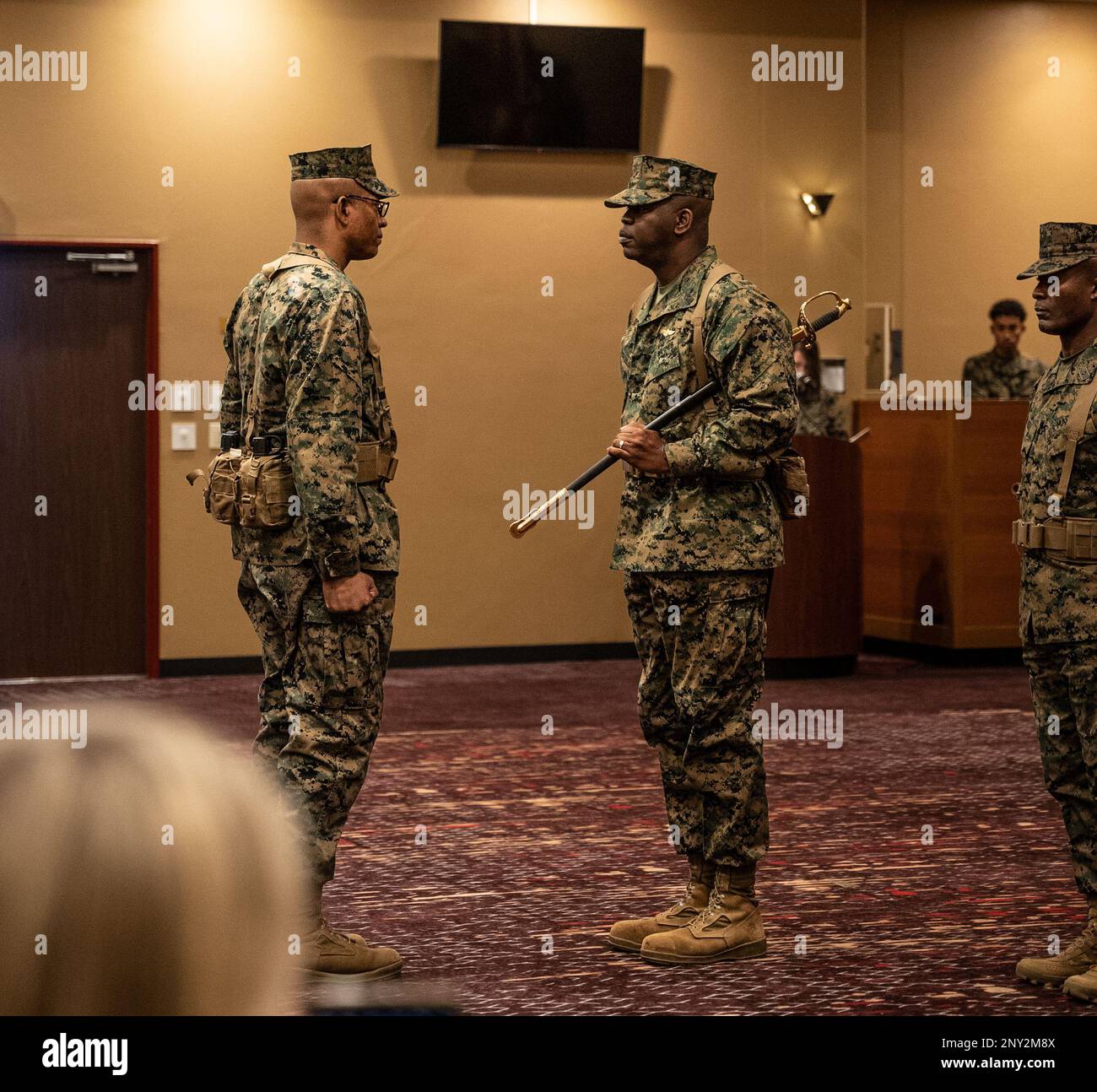 U.S. Marine Corps Sgt. Maj. Charles B. Peoples, right, outgoing sergeant major of 3rd ...