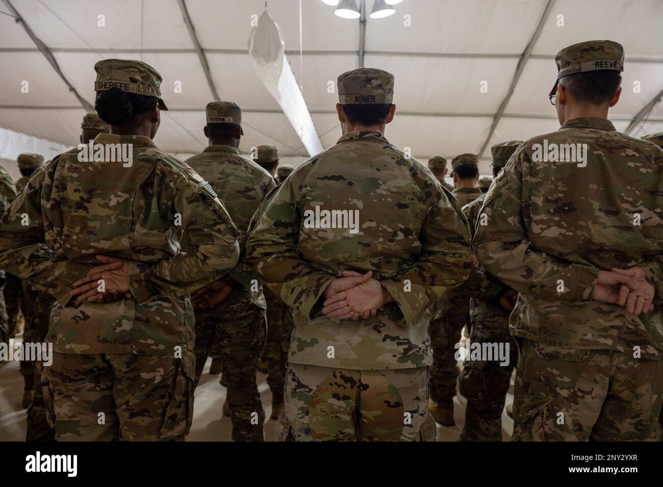 Soldiers assigned to the 378th Air Expeditionary Wing stand at parade ...