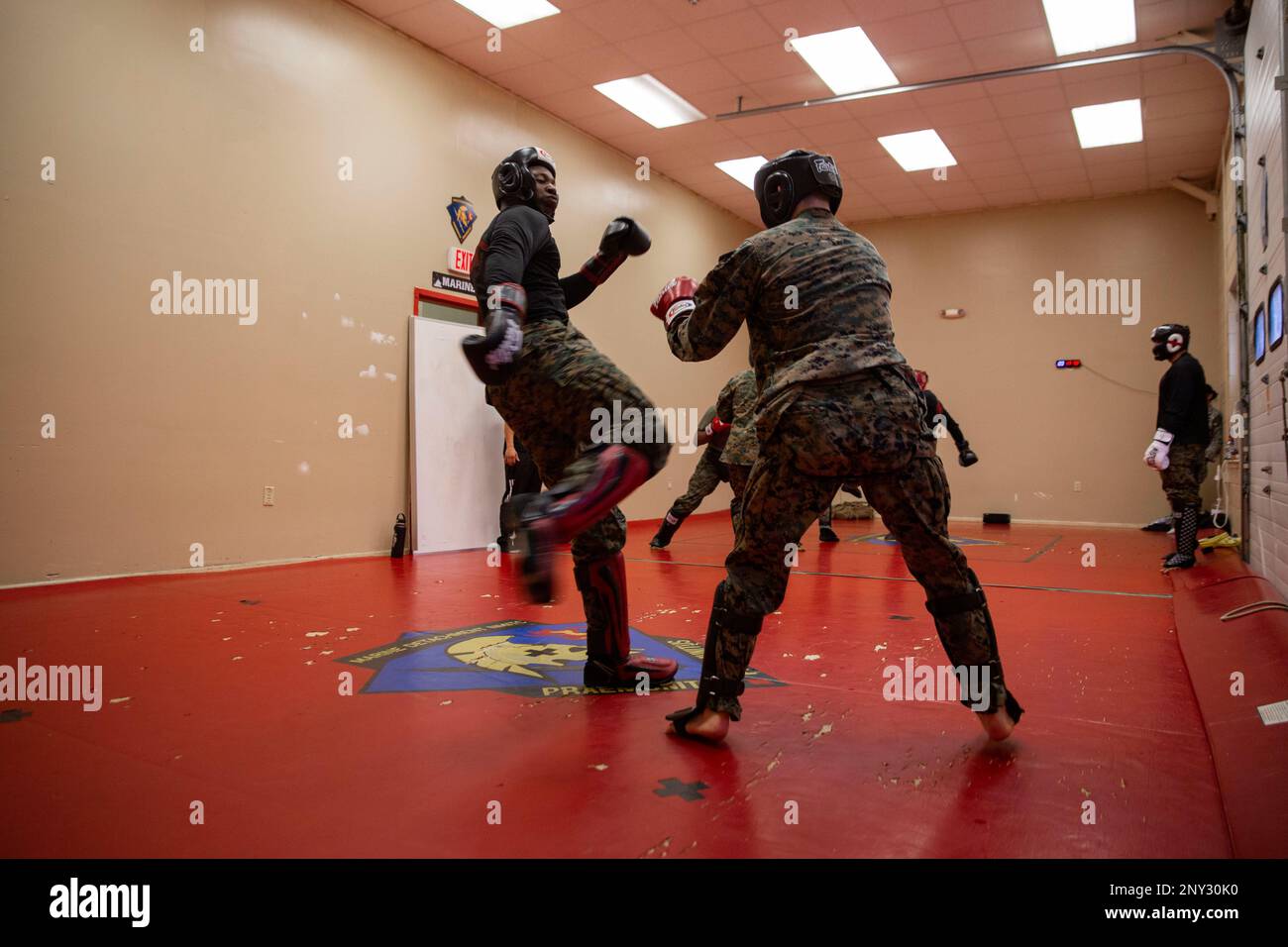 U.S. Marine Corps Gunnery Sgt. Jonathan L. Godley, left, a theater ...