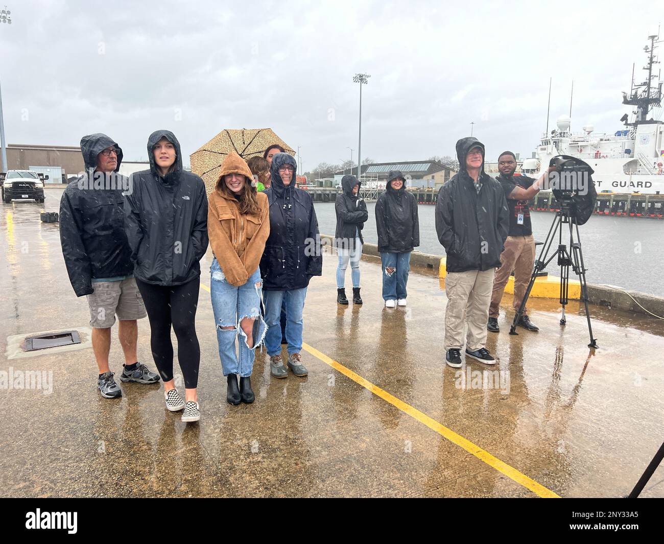 Family members wait to greet the crew of the USCGC Legare (WMEC 912 ...
