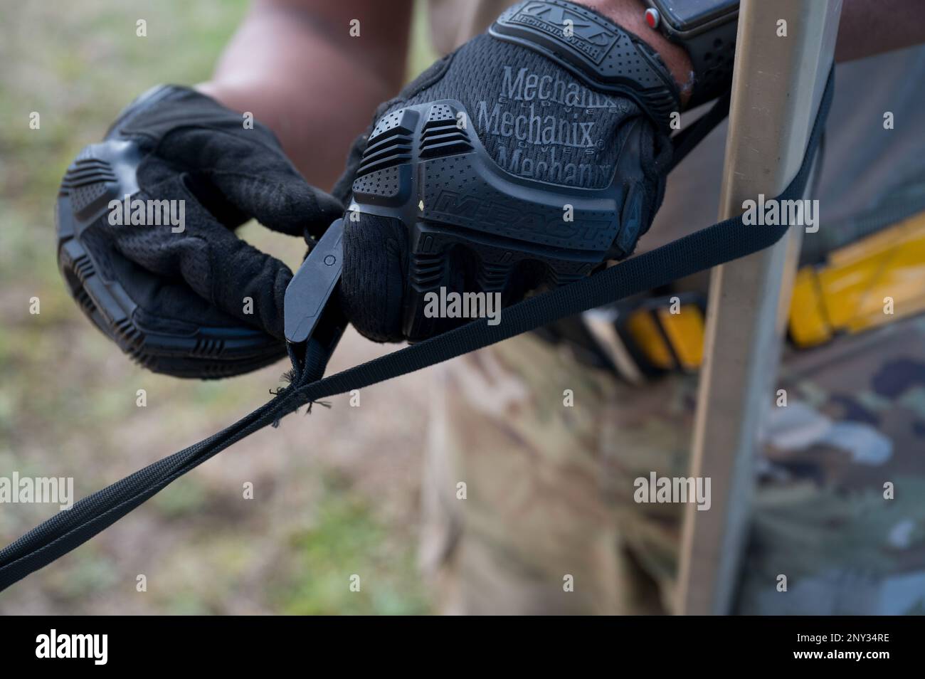 A U.S. Air Force Airman helps set up a mobile command and control point ...