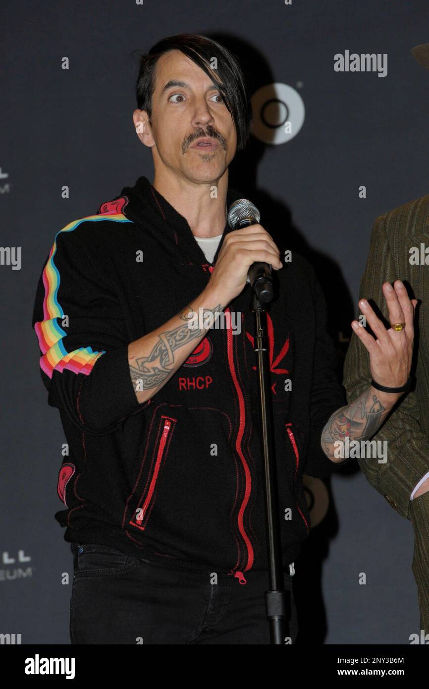 Anthony Kiedis of the Red Hot Chili Peppers poses in the press room at ...