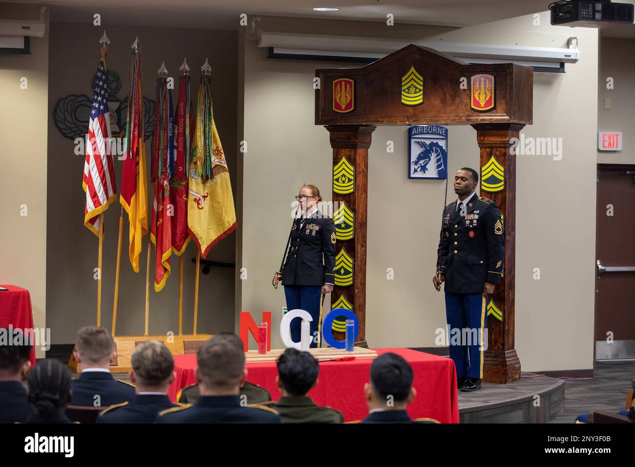 Two Noncommissioned officers stand at the NCO arches during the 18th ...