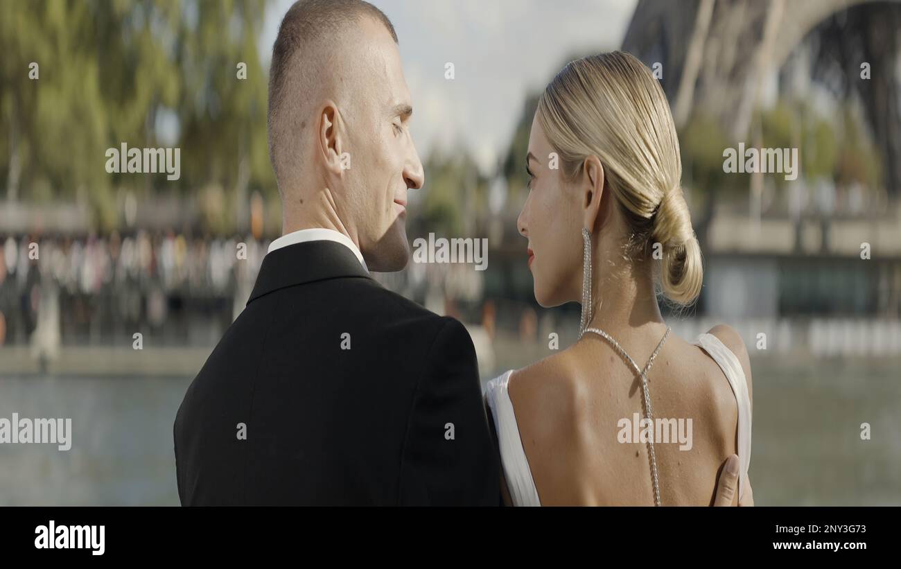 A kissing European couple. Action. A young beautiful blonde woman with ...