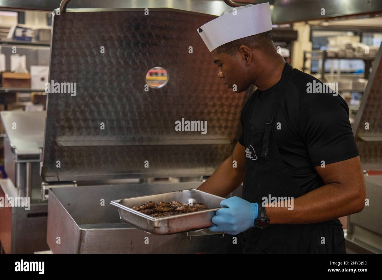 U.S. Marine Corps Cpl. Alonza Humphrey, a food service specialist with ...