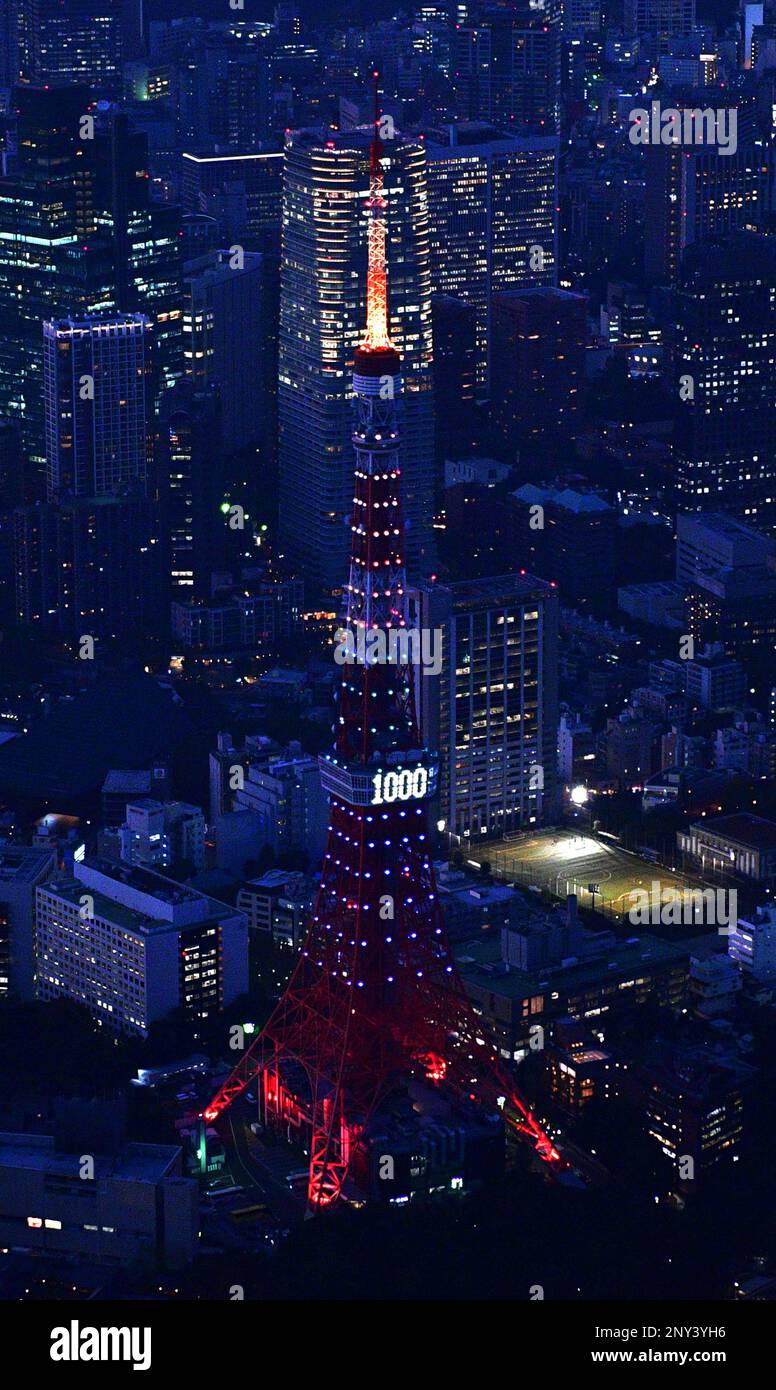This aerial photo shows the Tokyo Tower put the light on 1000 digit and ...