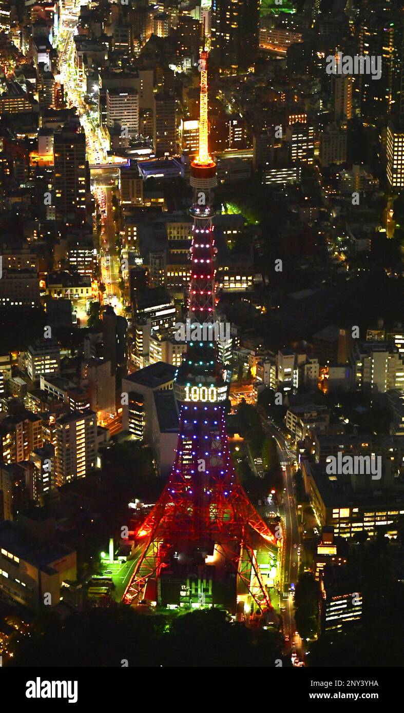 This aerial photo shows the Tokyo Tower put the light on 1000 digit and ...