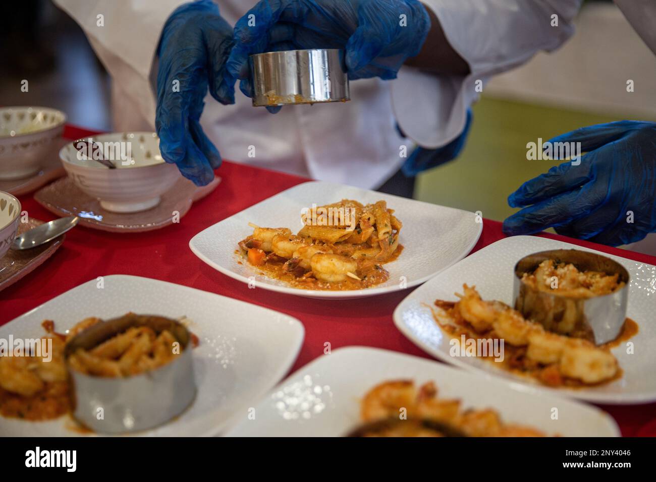 U.S. Marine Corps Cpl. Emerson Baltazar, a food service specialist with ...