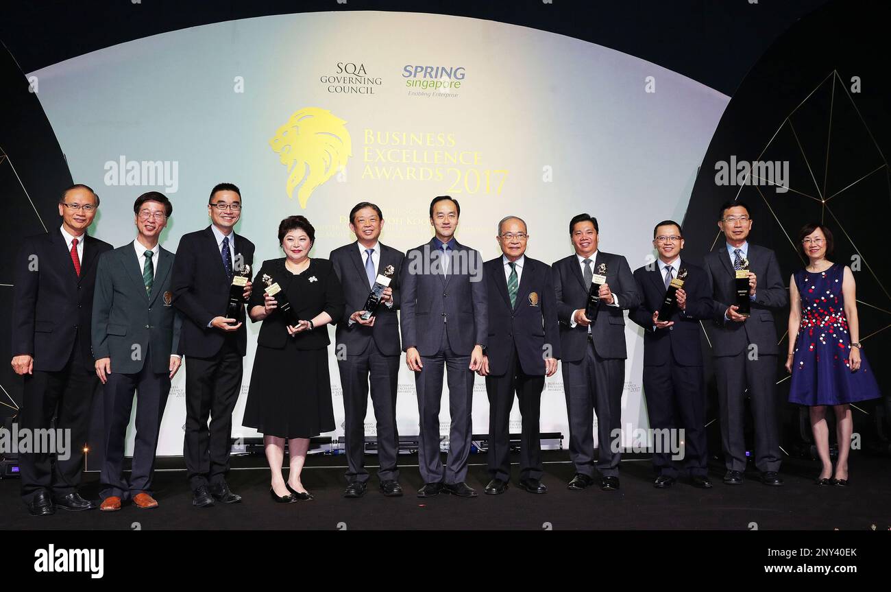 (from left to right) Mr Ted Tan, Deputy Chief Executive, SPRING Singapore; Dr Ang Hak Seng ...