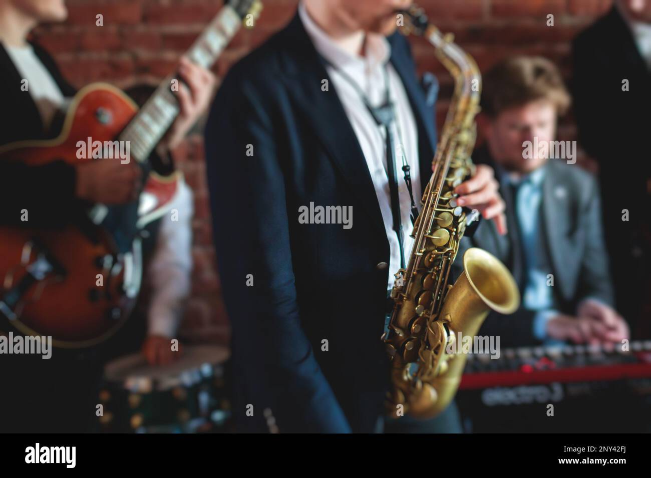 Concert view of saxophonist on a stage, a saxophone sax player with ...