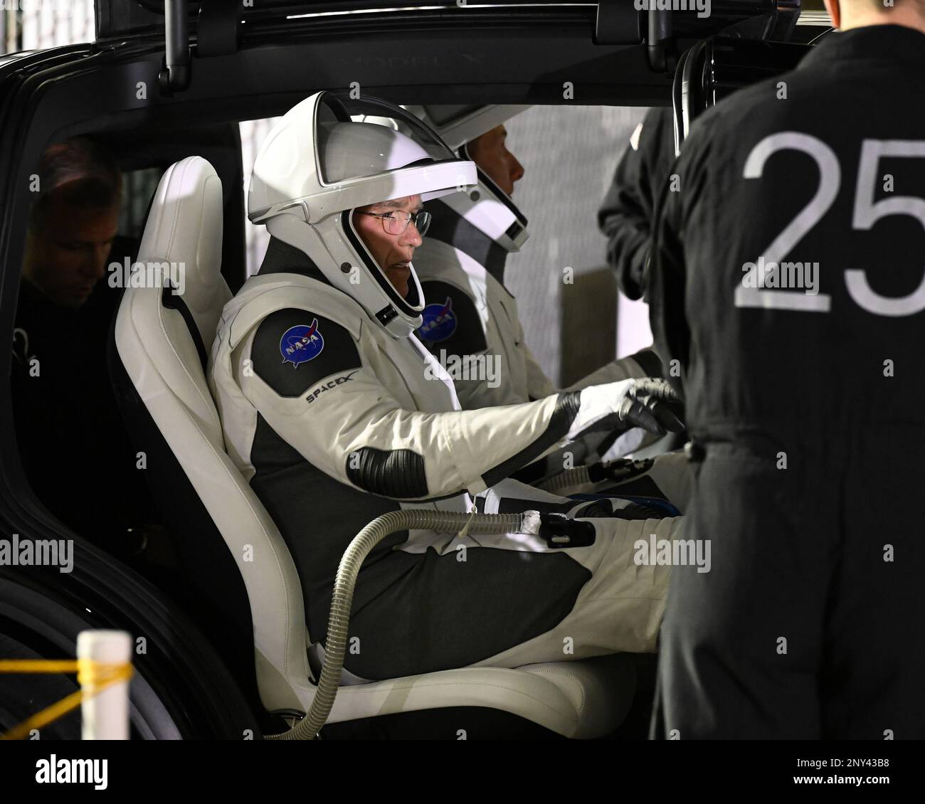 NASA Astronaut Stephen Bowen (near) and Warren Hoburg sit in a modified ...