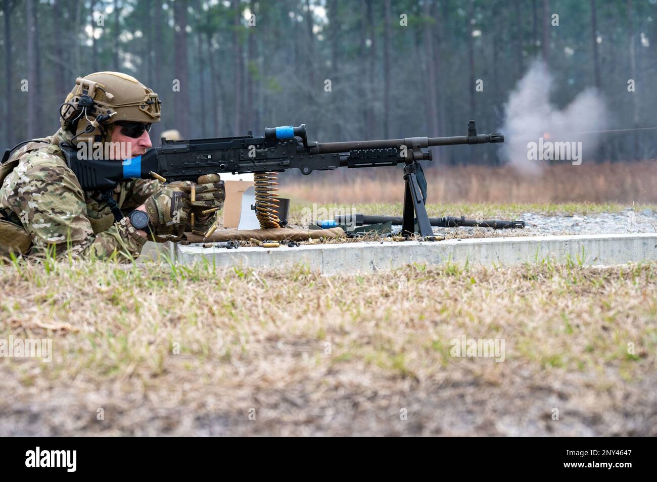 A 304th Rescue Squadron pararescueman fires an M240 machine gun ...