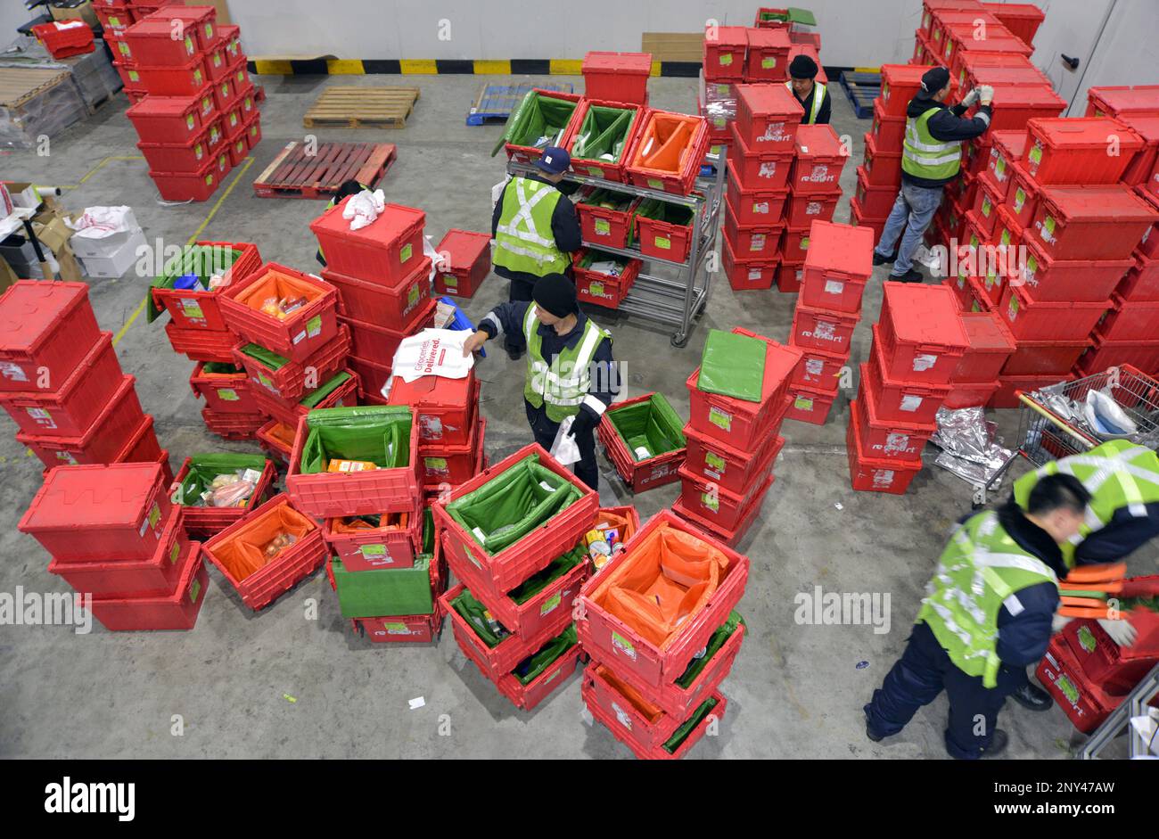 Staff at work at Singapore online grocery store RedMart. RedMart is ...