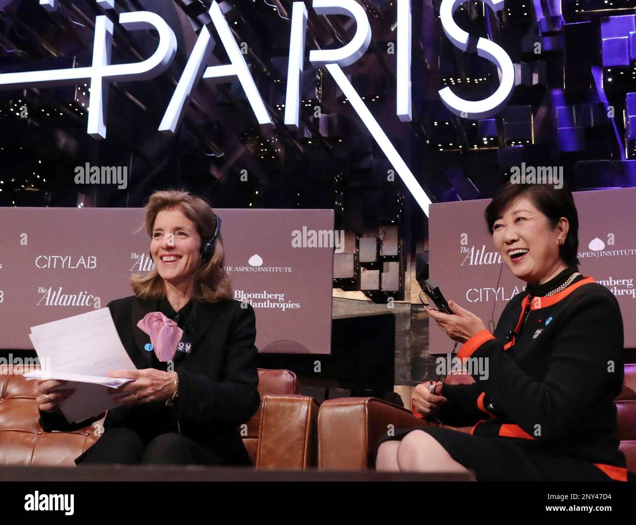 Party of Hope leader and Tokyo governor Yuriko Koike (R) talks with ...