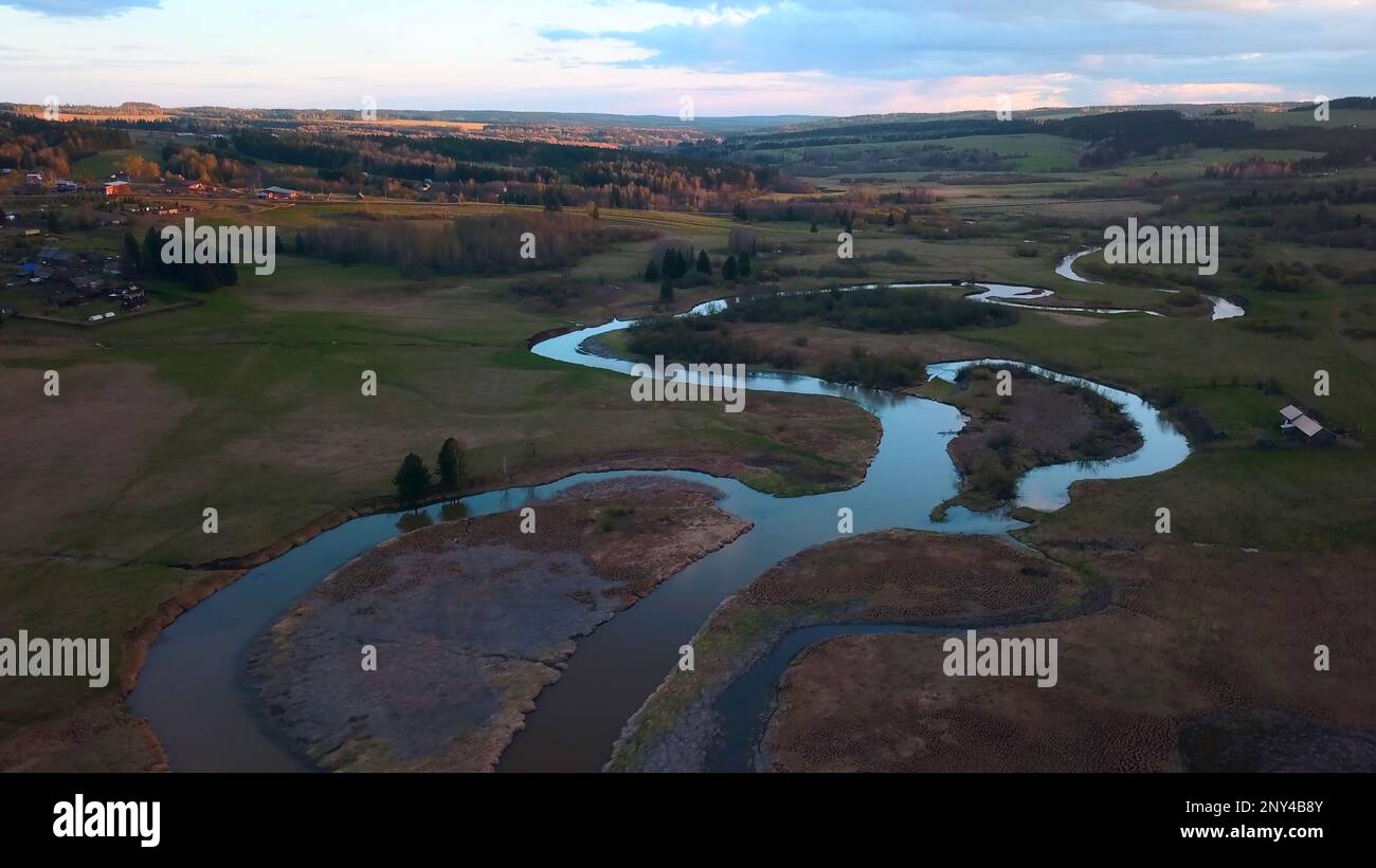 Top view of river pattern. Clip. River with curved patterns near ...