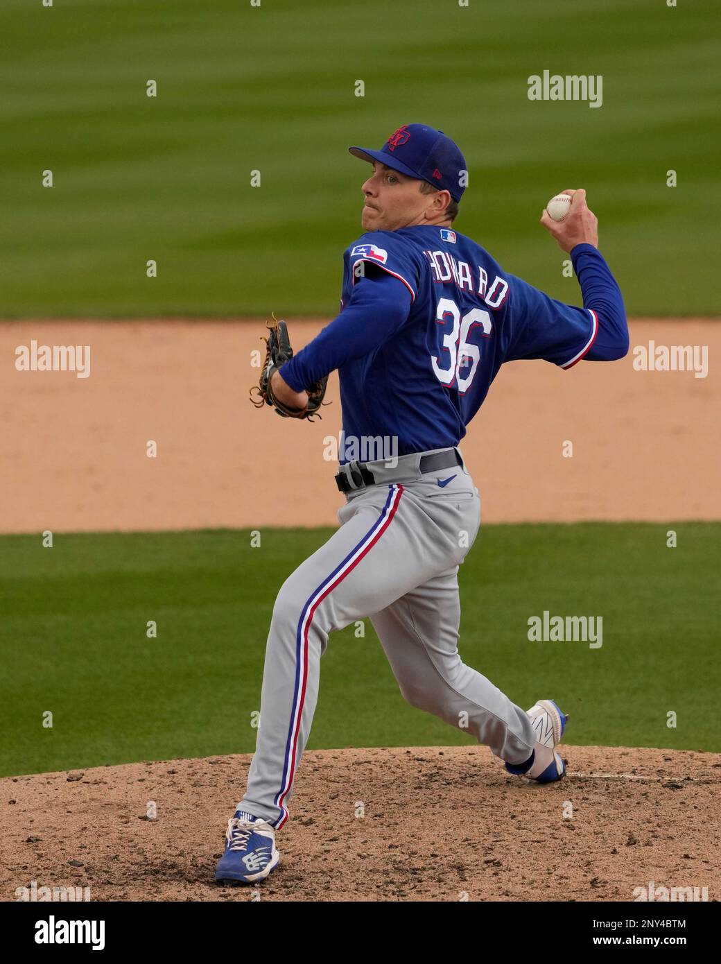 Texas Rangers pitcher Spencer Howard throws during the fifth inning of ...