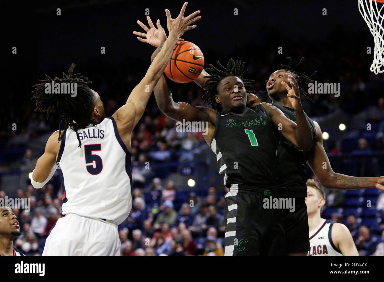 Chicago State guard Wesley Cardet Jr. (1) grabs a rebound next to ...