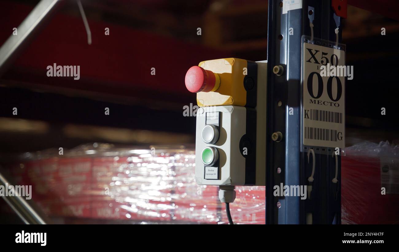 Warehouse. Creative. The hand adjusting the buttons for unpacking goods ...