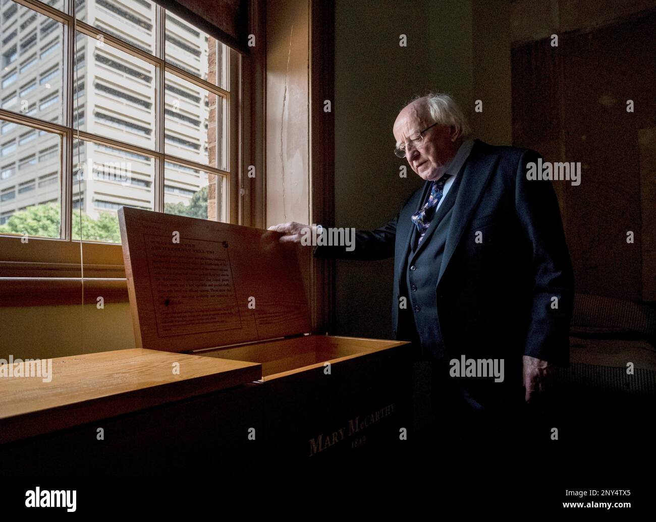 Irish President Michael Higgins inspects an exhibition dedicated to the ...