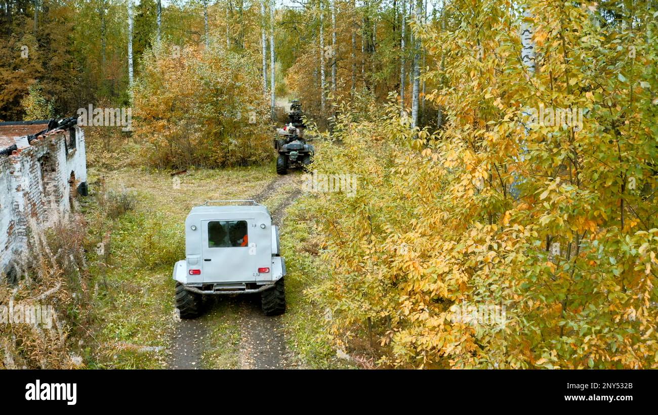 Scooters driving on narrow road hi-res stock photography and images - Alamy