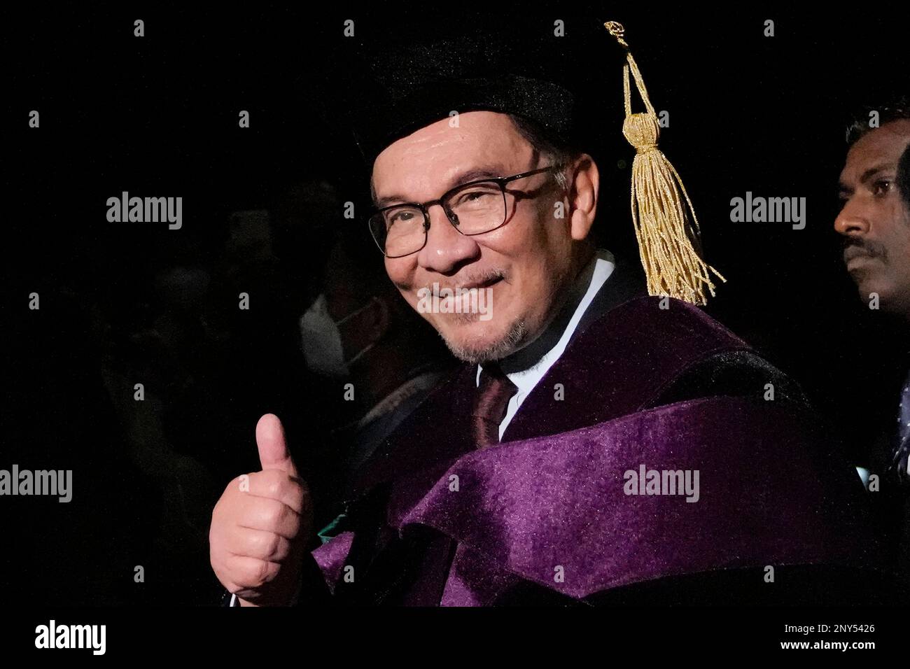 Malaysia's Prime Minister Anwar Ibrahim flashes the thumbs-up sign ...