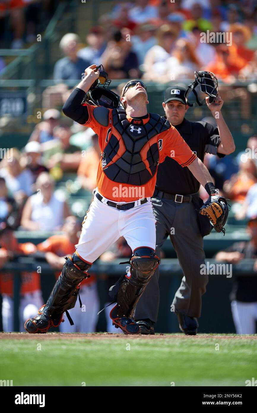 Baltimore Orioles catcher Matt Wieters (32) looks for a popup in front ...