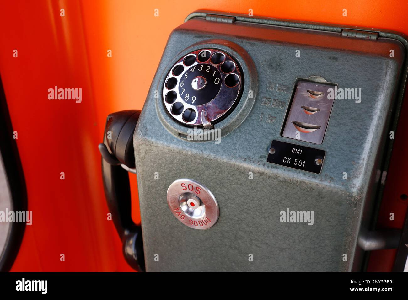 Swedish 1960s payphone inside an orange phone boot Stock Photo - Alamy